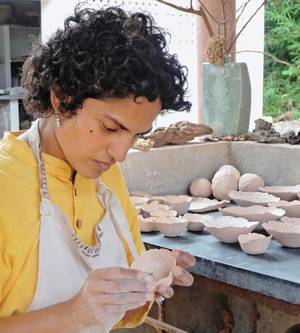 Behind the potter’s wheel